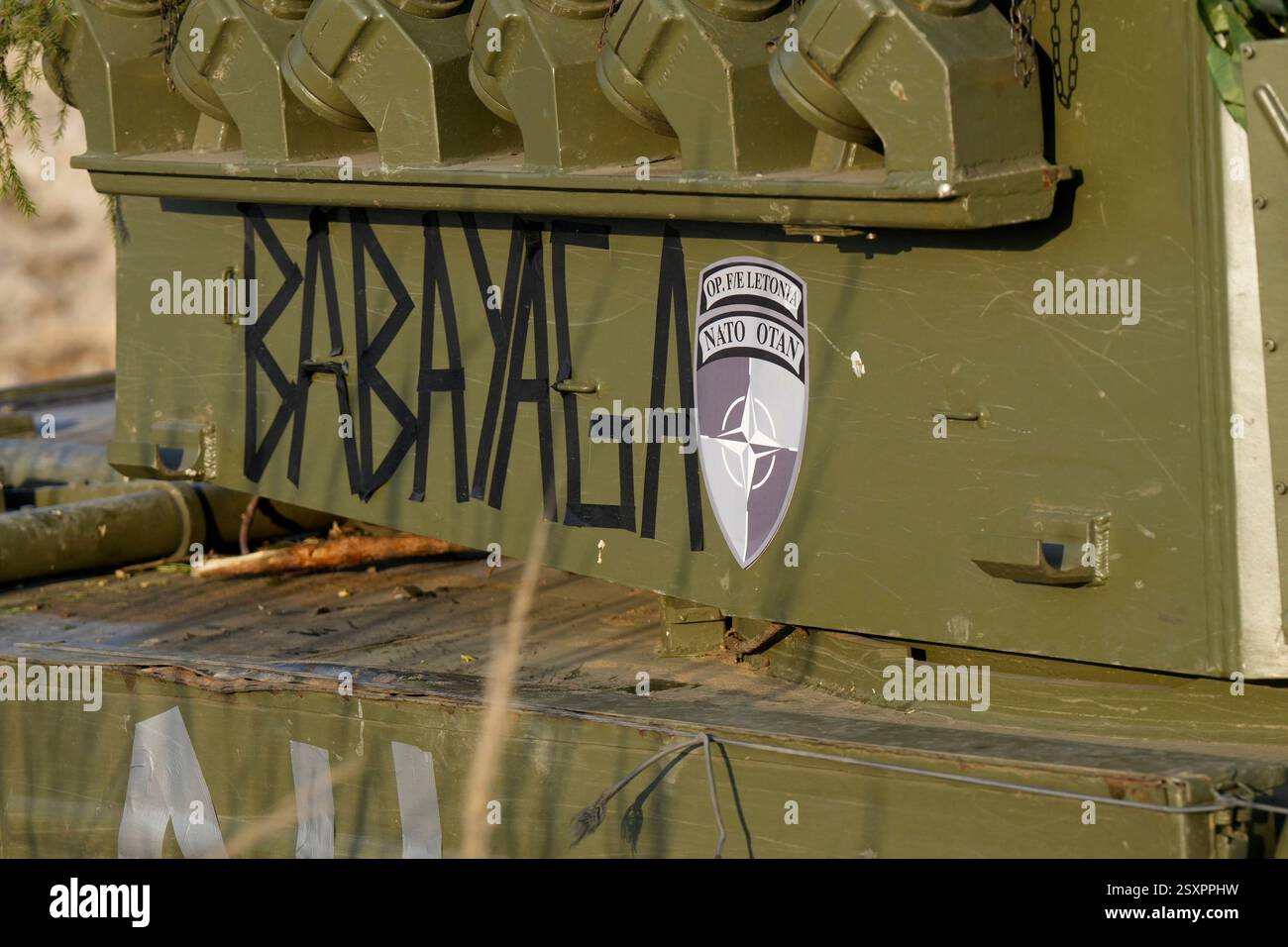 Adazi, Vidzeme Region, Latvia. 25th Feb, 2025. Signs are seen on the ...