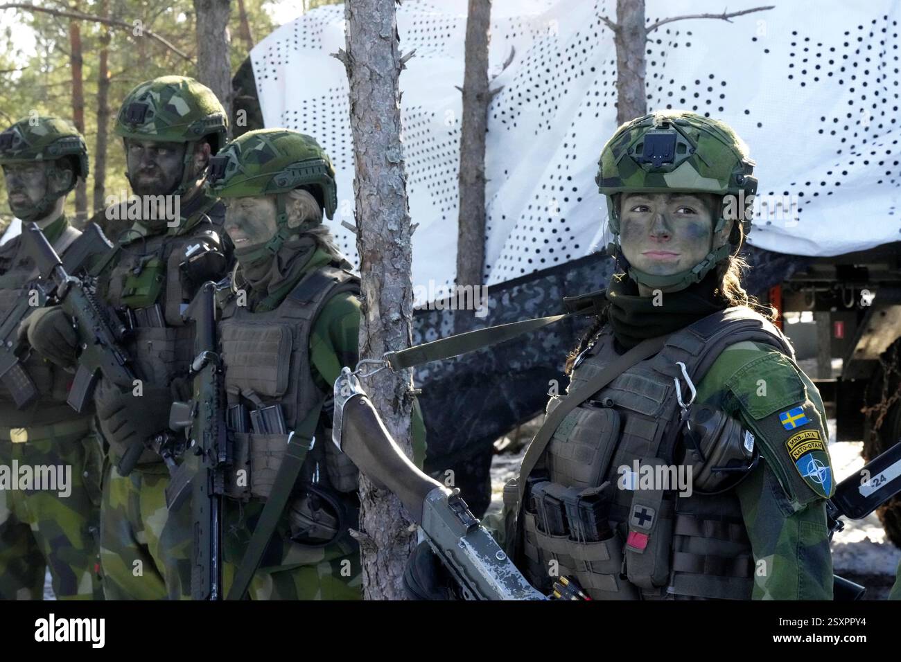 Adazi, Vidzeme Region, Latvia. 25th Feb, 2025. Swedisn army troops of ...