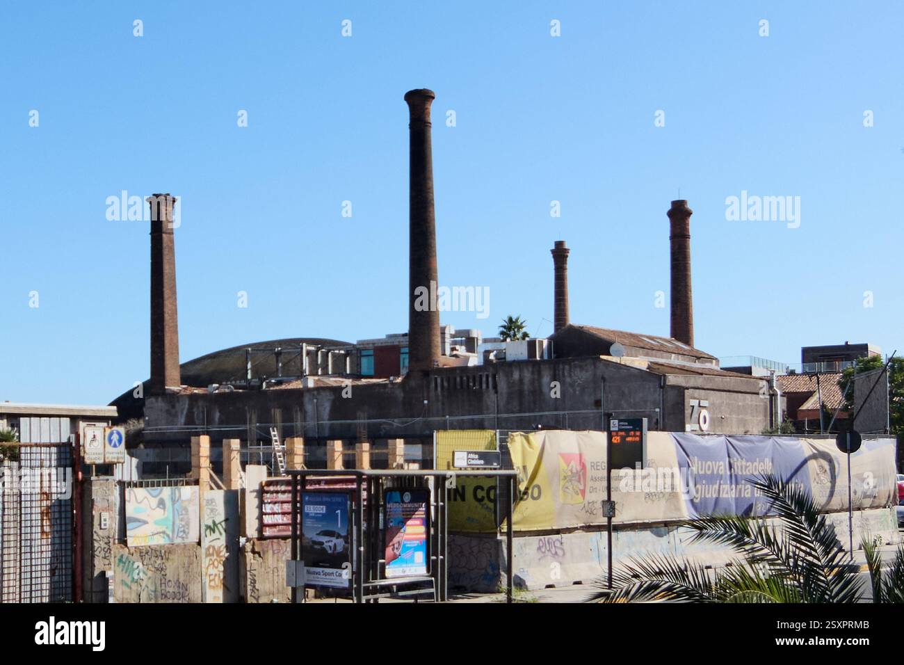 Catania. Italy - February 25, 2025: Old factory with multiple brick ...