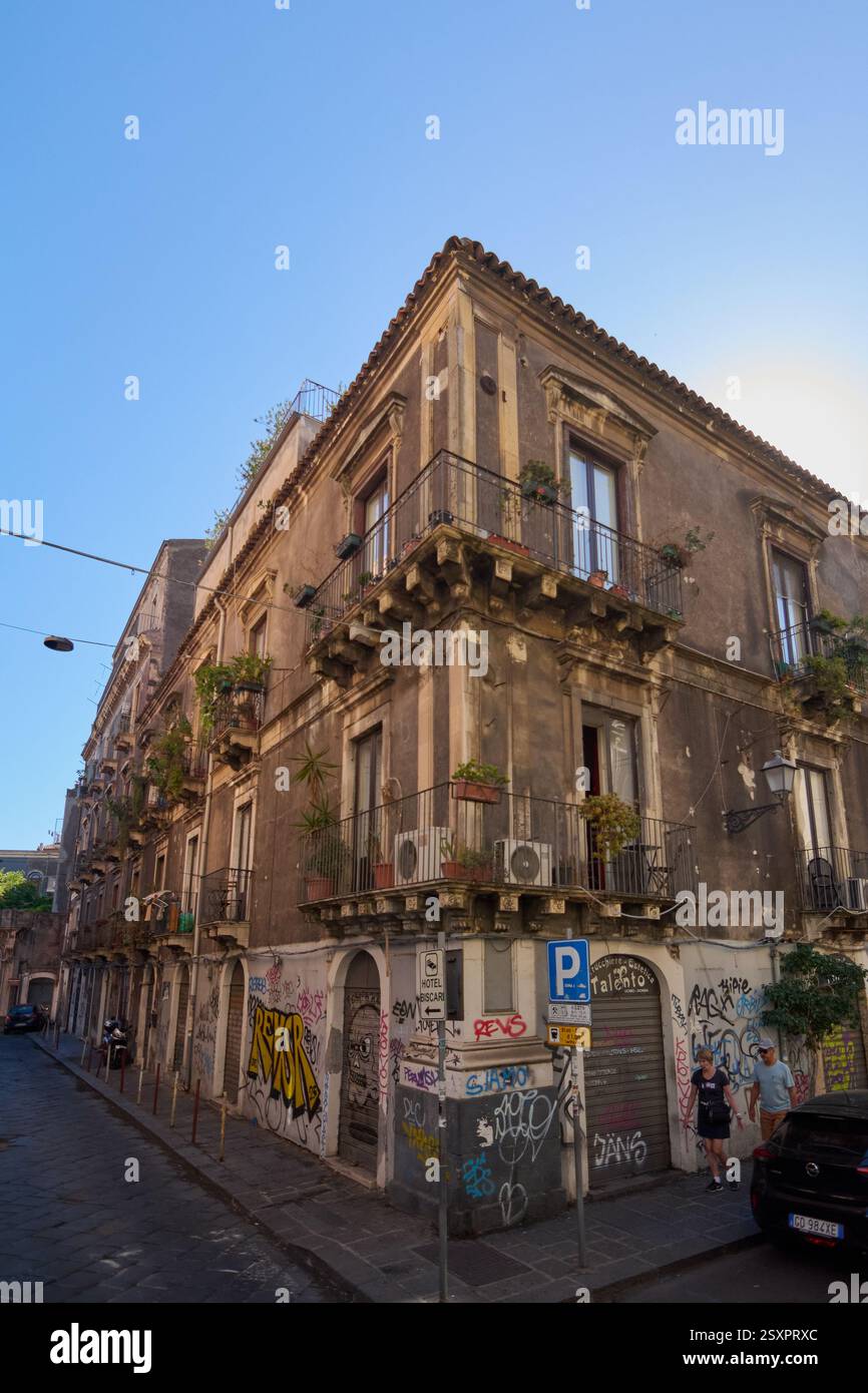 Catania, Italy - February 25, 2025: Narrow Catania alley showcases ...