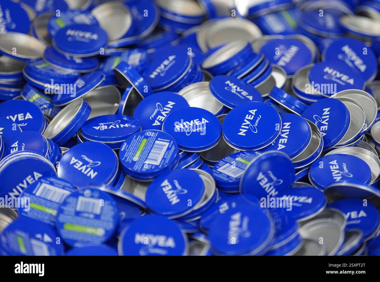 Hamburg, Germany. 25th Feb, 2025. Empty cans of Nivea Creme lie in a ...