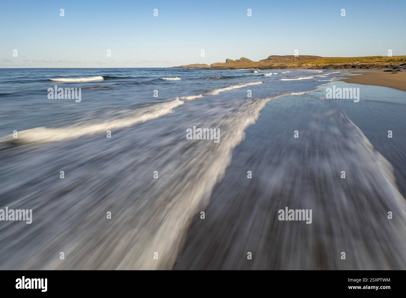 A dynamic aerial view of Saligo Bay on the Isle of Islay, Scotland ...