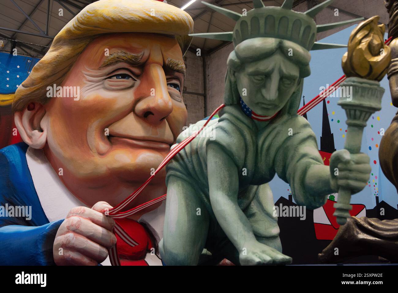 Cologne, Germany. 25th Feb, 2025. A carnival float features US ...