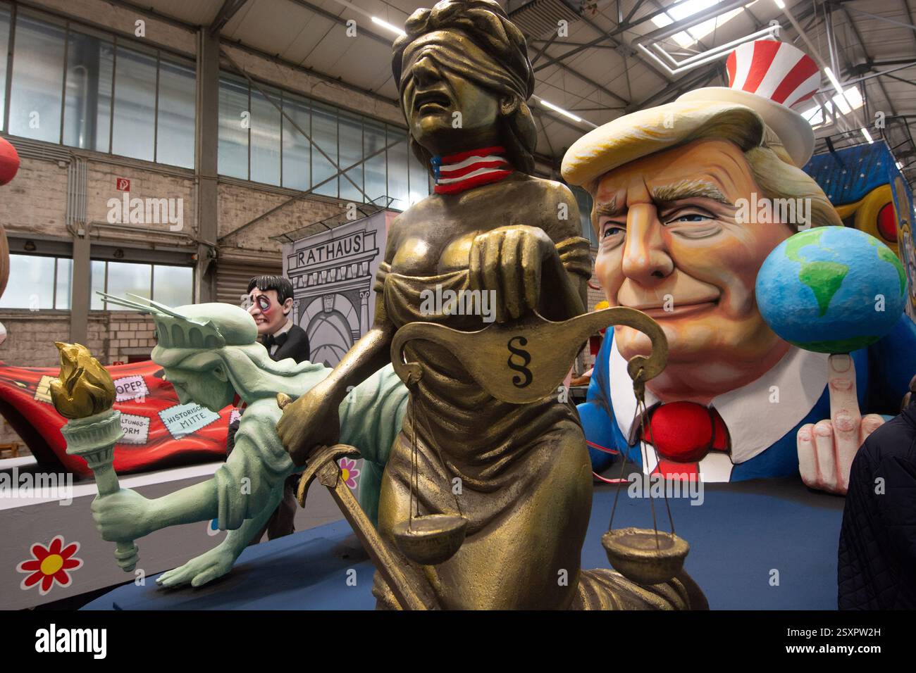 Cologne, Germany. 25th Feb, 2025. A carnival float features US ...