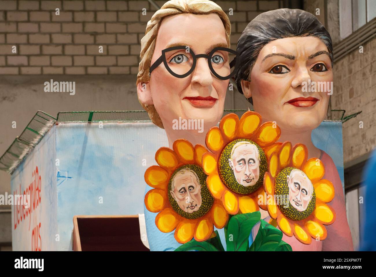 Cologne, Germany. 25th Feb, 2025. A carnival float features German ...