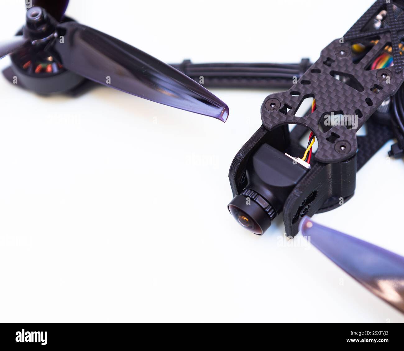 FPV drone in production on white background Stock Photo - Alamy