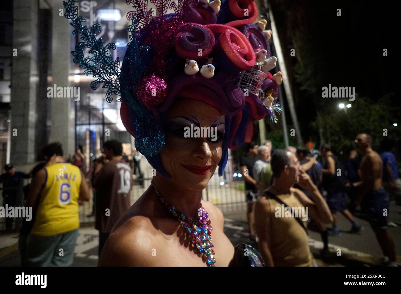 Revelers have fun at the pre-carnival street party in Sao Paulo, Brazil ...
