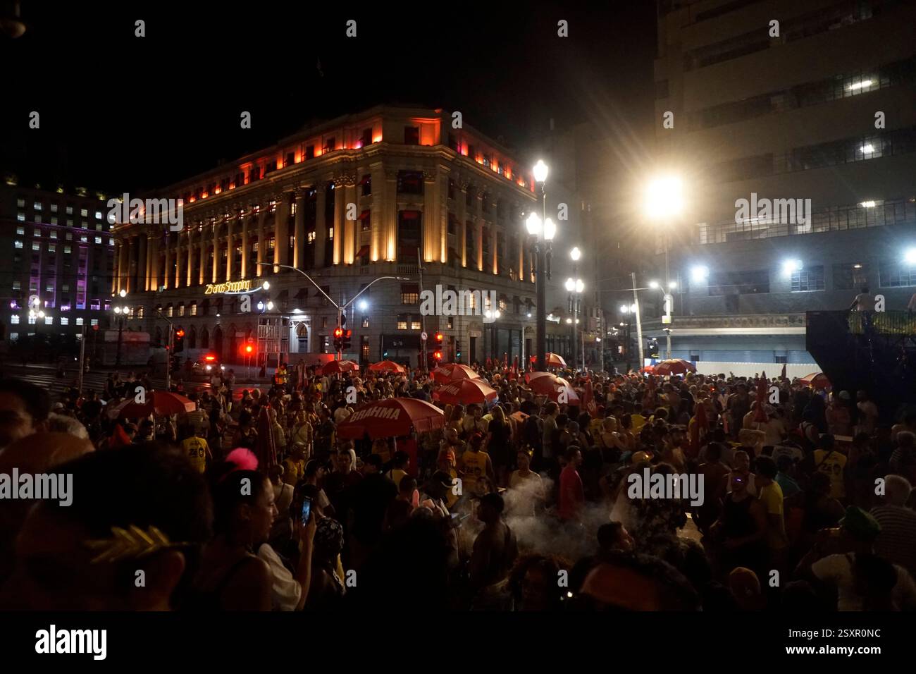 Revelers have fun at the pre-carnival street party in Sao Paulo, Brazil ...