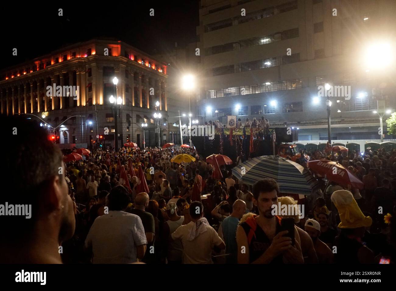 Revelers have fun at the pre-carnival street party in Sao Paulo, Brazil ...