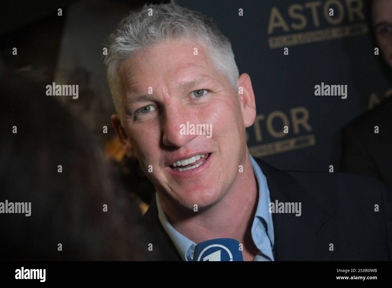 Munich, Germany. 25th Feb, 2025. Former soccer player Bastian ...