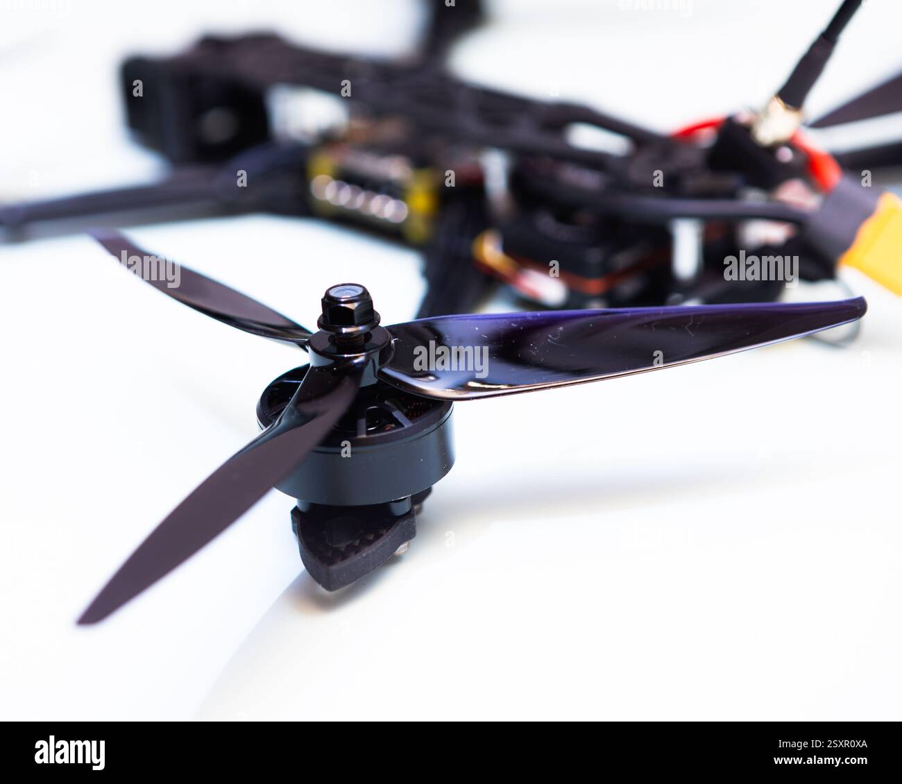 FPV drone in production on white background Stock Photo - Alamy