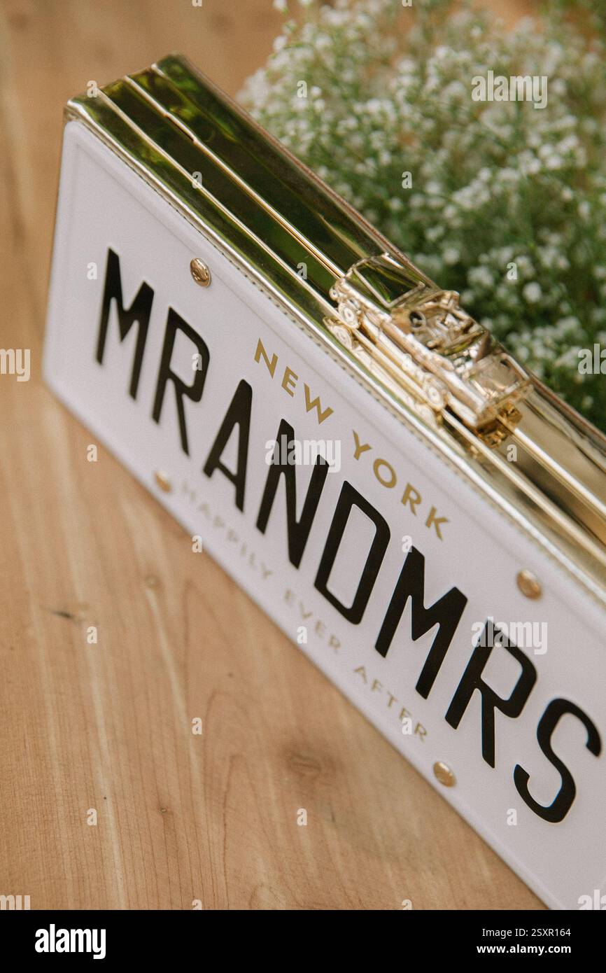 A decorative box with a New York license plate styled as Mr. and Mrs ...