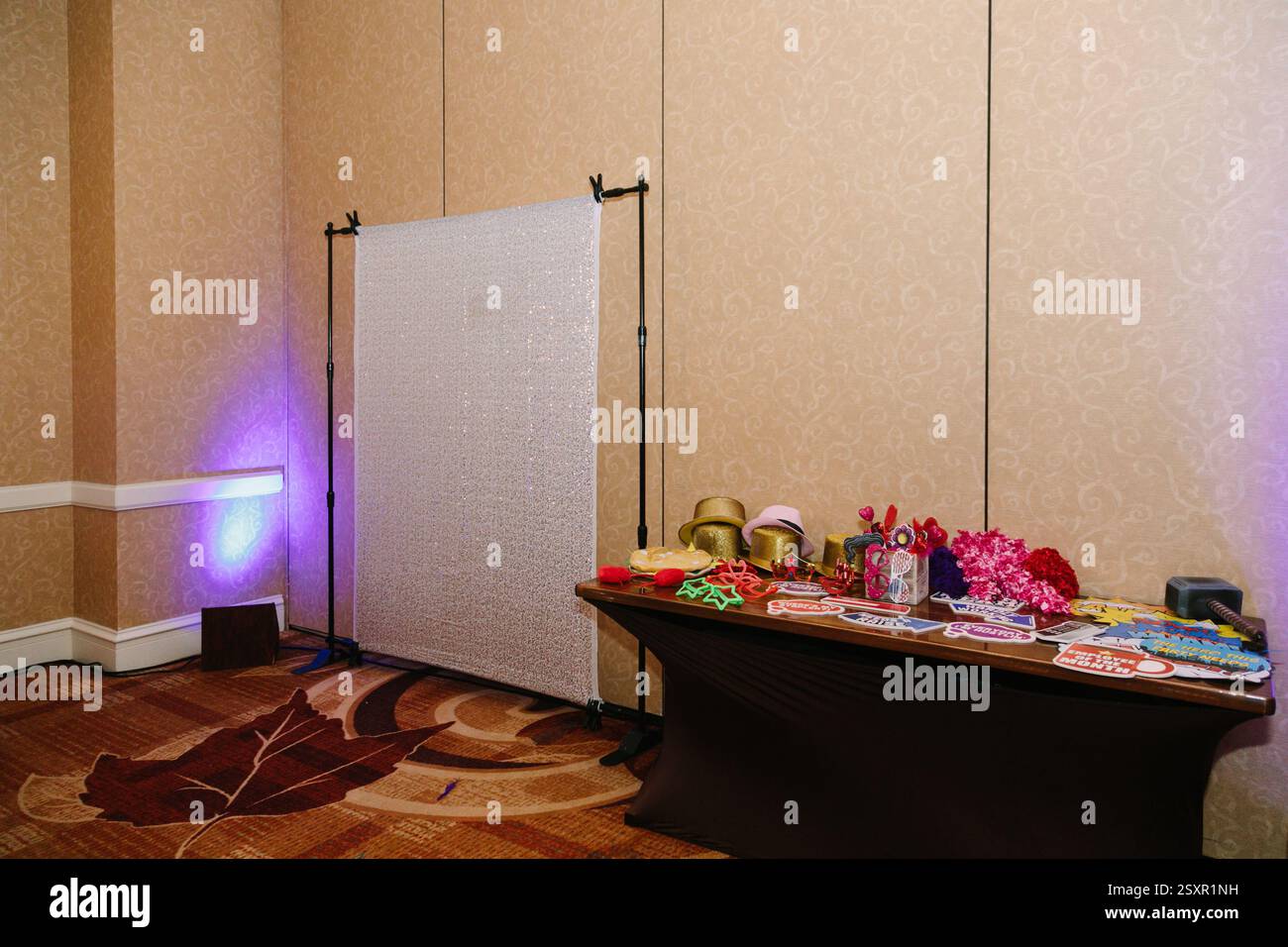 Backdrop setup for a festive celebration featuring various props on ...