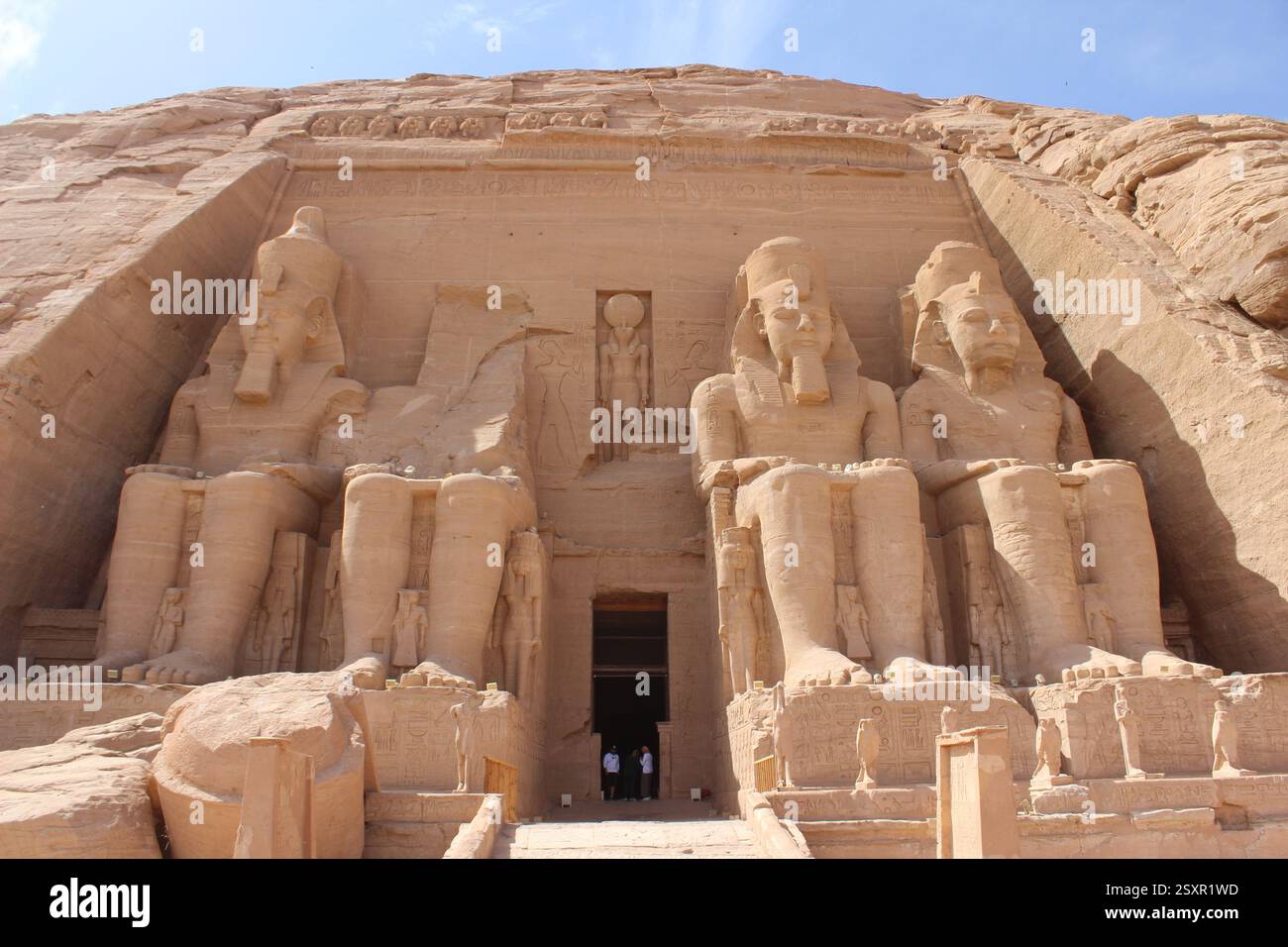 The great entrance of Abou Simbel temple in Egypt with huge statues in ...