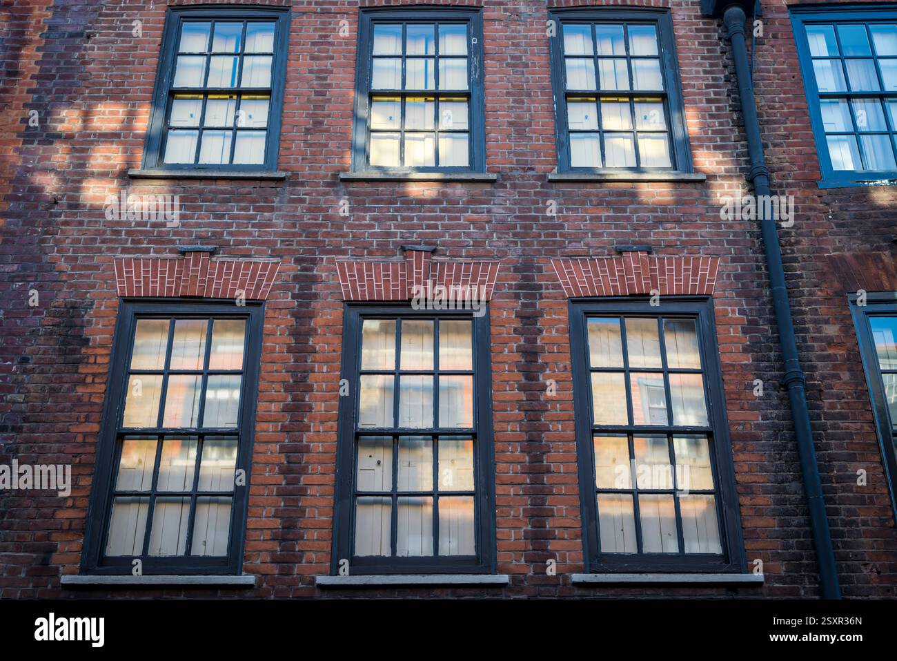Windows with reflections, East End, London, England, UK Stock Photo - Alamy