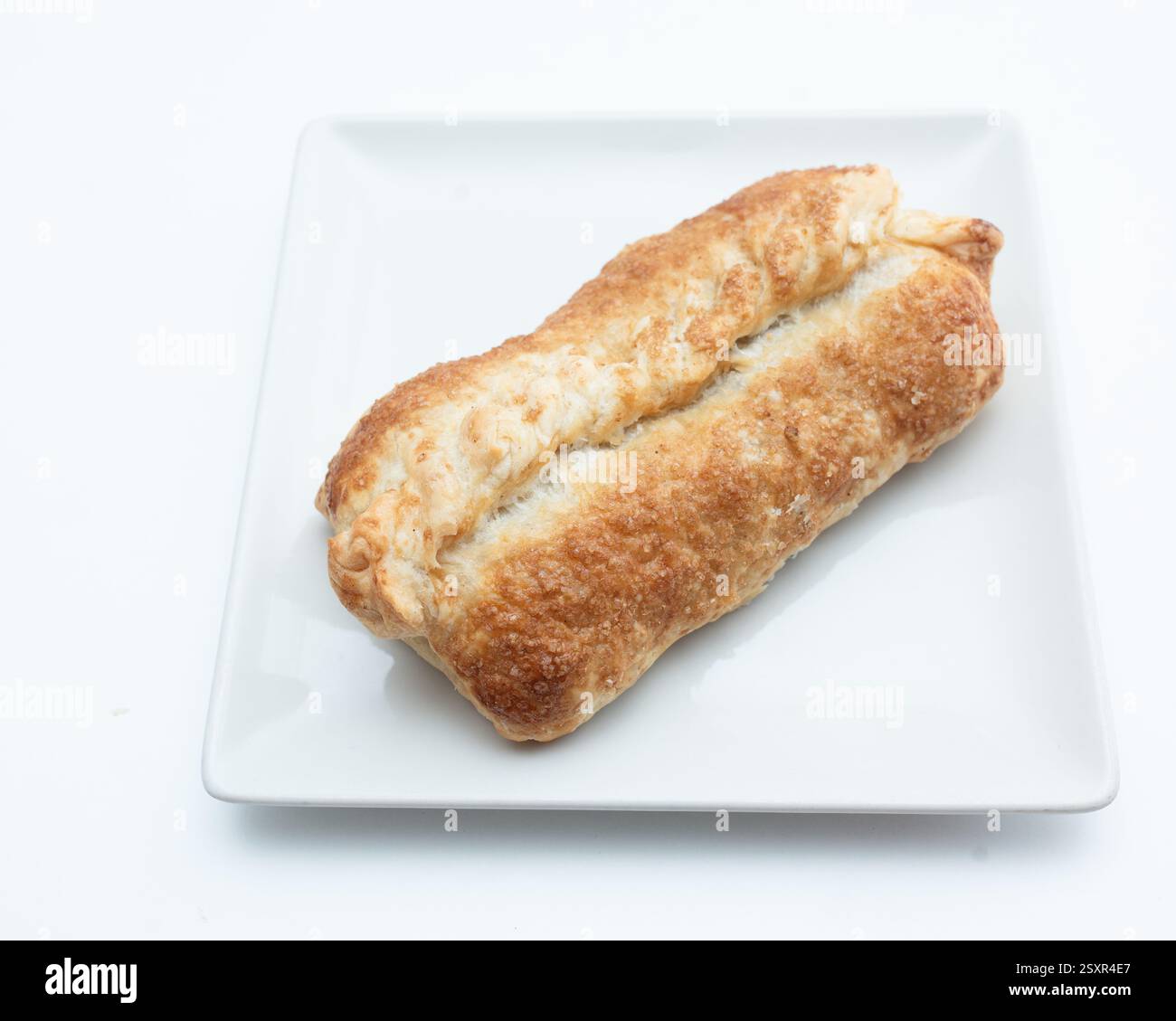 One crisp apple pie is highlighted on a white background Stock Photo ...