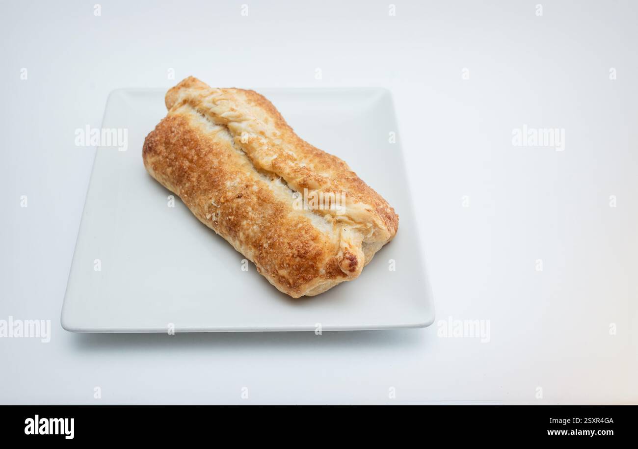 One crisp apple pie is highlighted on a white background Stock Photo ...