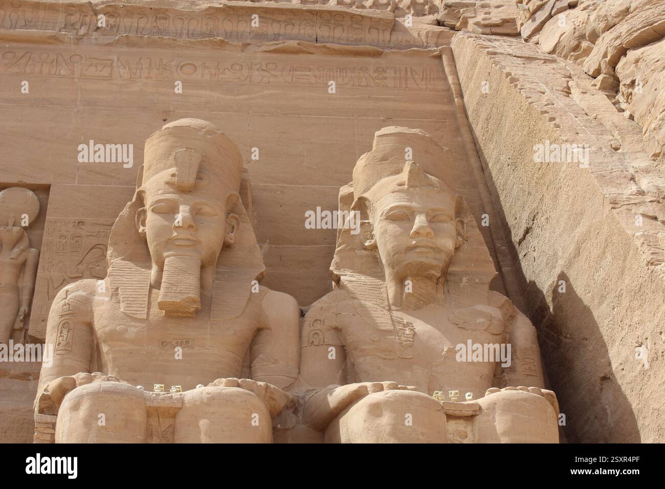 The great entrance of Abou Simbel temple in Egypt with huge statues in ...