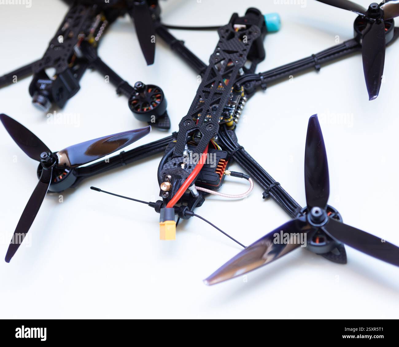 FPV drone in production on white background Stock Photo - Alamy