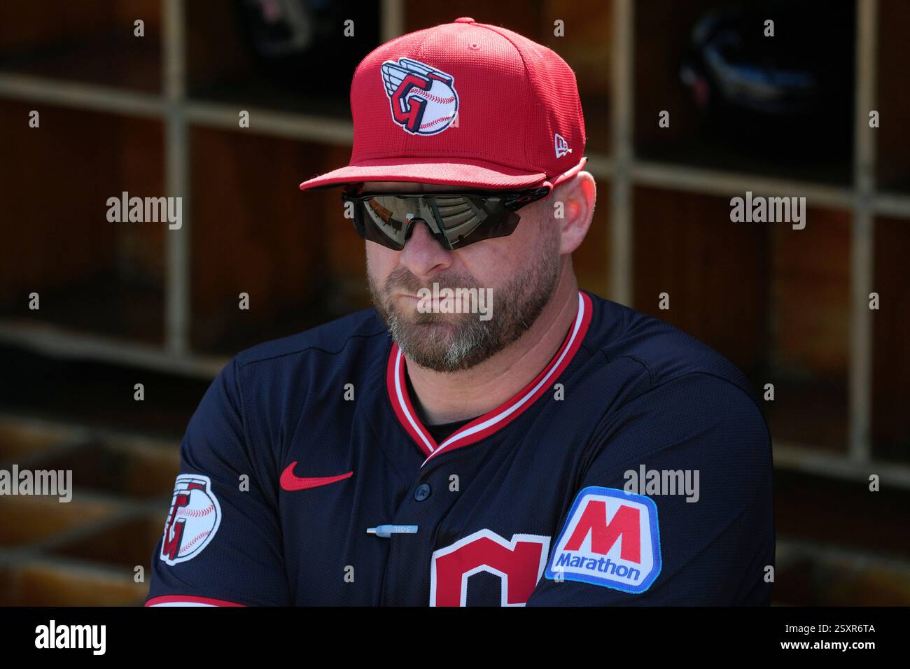 Cleveland Guardians manager Stephen Vogt pauses in the dugout prior to ...