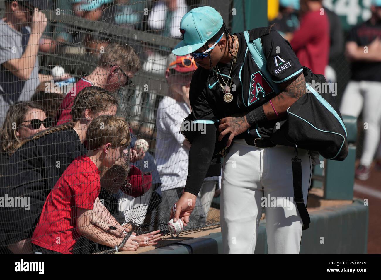 Arizona Diamondbacks' Christian Cerda signs autographs prior to a ...