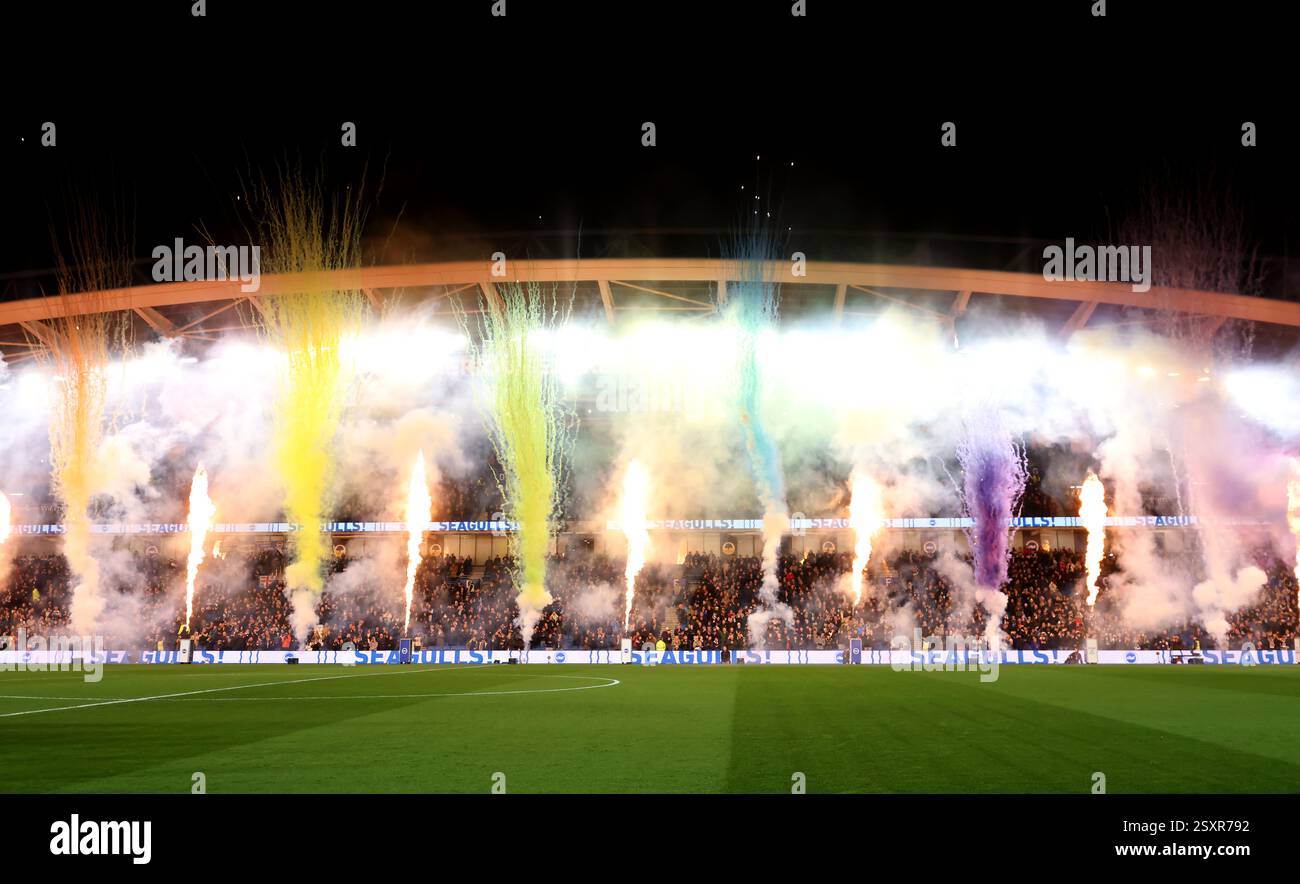 A general view of the teams walking onto the field as pyrotechnics are ...