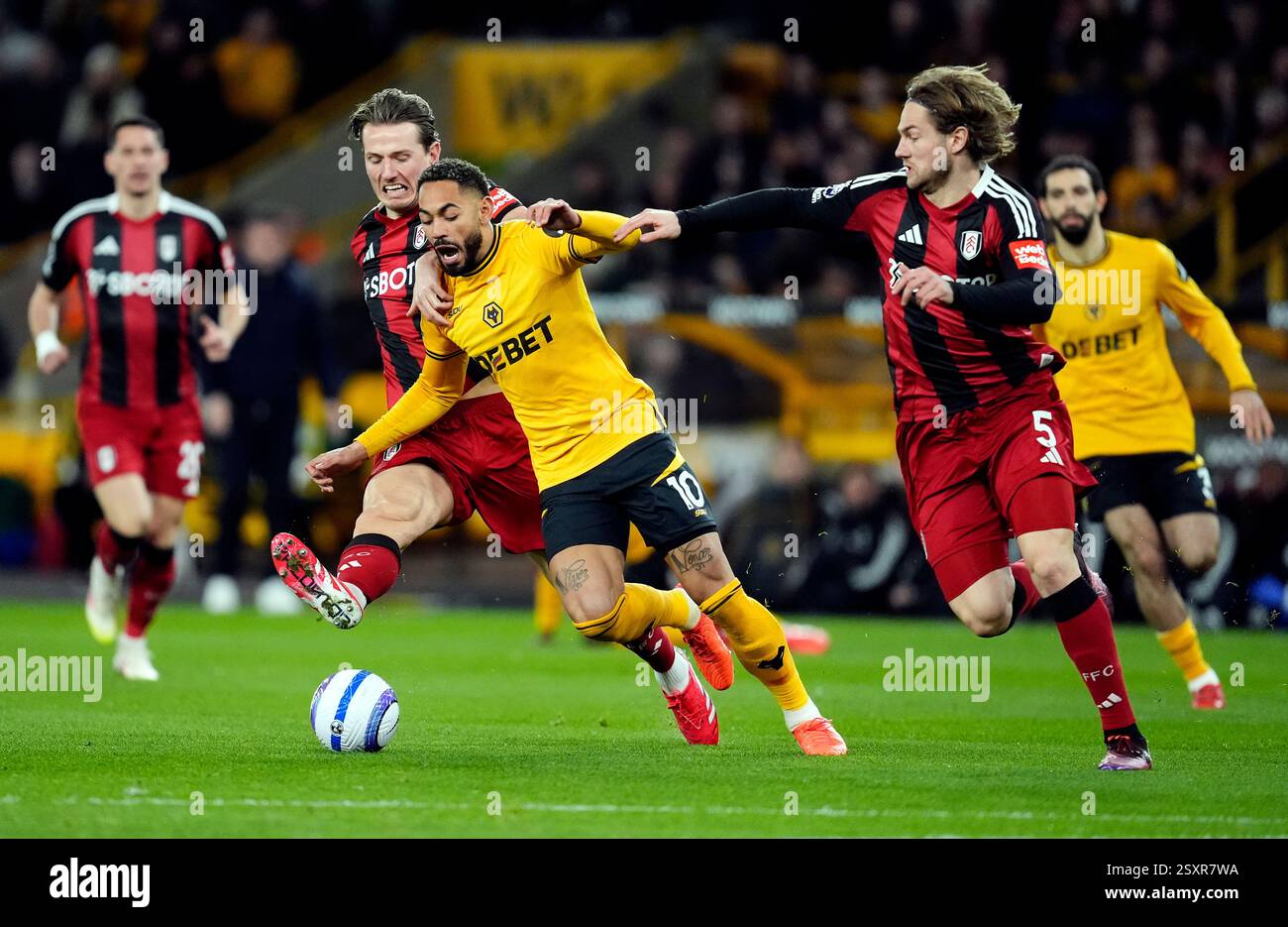 Fulham's Sander Berge (left) and Wolverhampton Wanderers' Matheus Cunha ...