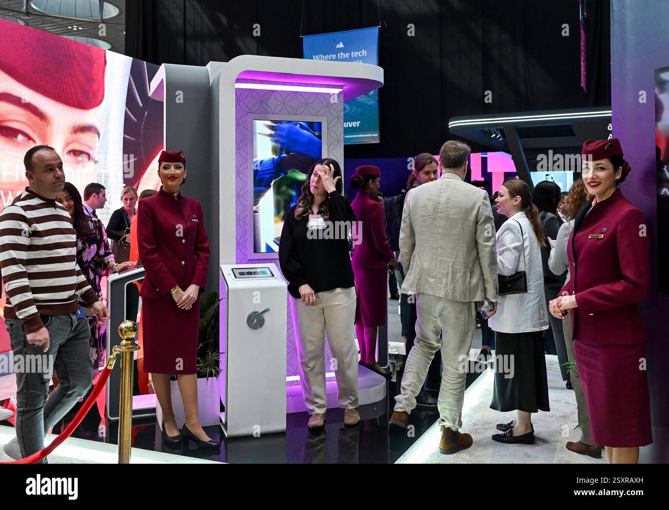 WEB SUMMIT QATAR 2025 - DAY THREE People visit the Qatar Airways stand ...