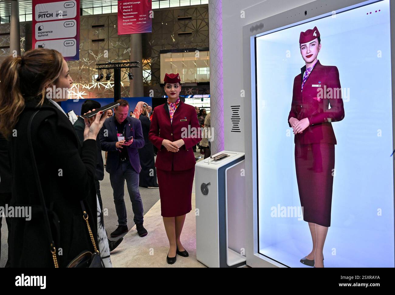 WEB SUMMIT QATAR 2025 - DAY THREE People visit the Qatar Airways stand ...