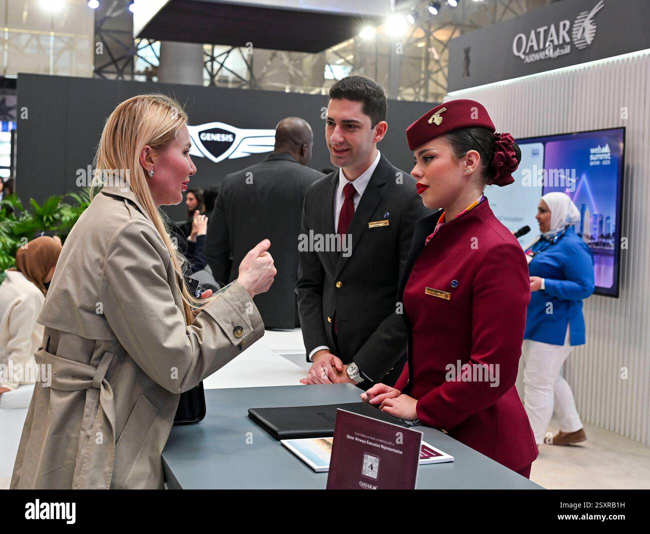 WEB SUMMIT QATAR 2025 - DAY THREE People visit the Qatar Airways stand ...
