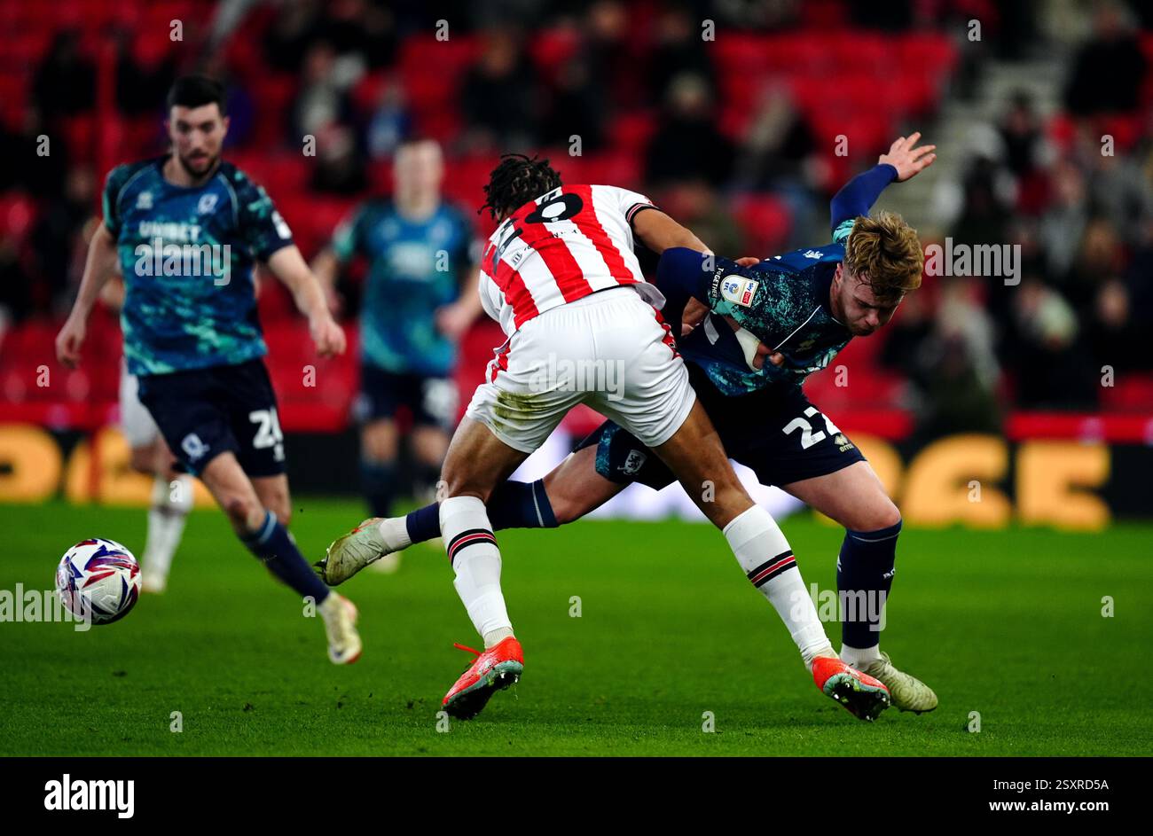 Stoke City's Ashley Phillips (left) and Middlesbrough's Tommy Conway ...