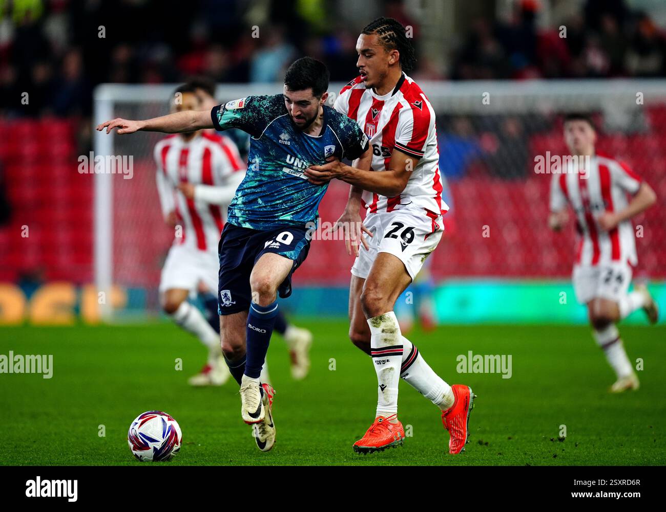 Stoke City's Ashley Phillips (right) and Middlesbrough's Finn Azaz ...