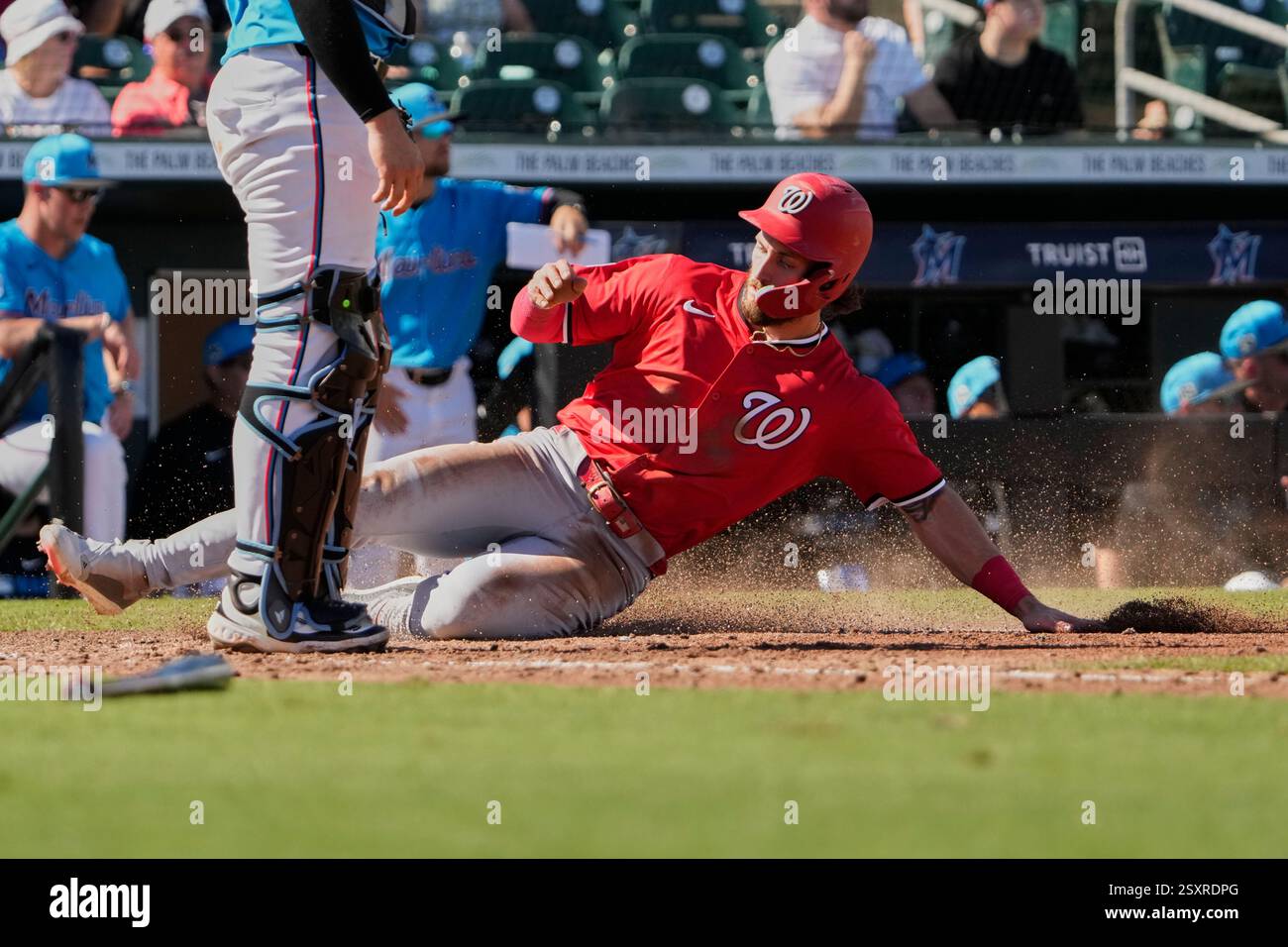 Washington Nationals' Dylan Crews scores during the fifth inning of a ...