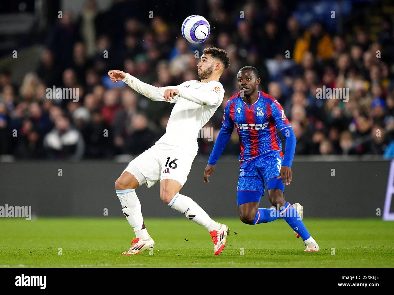 Aston Villa's Andres Garcia (left) and Crystal Palace's Tyrick Mitchell ...