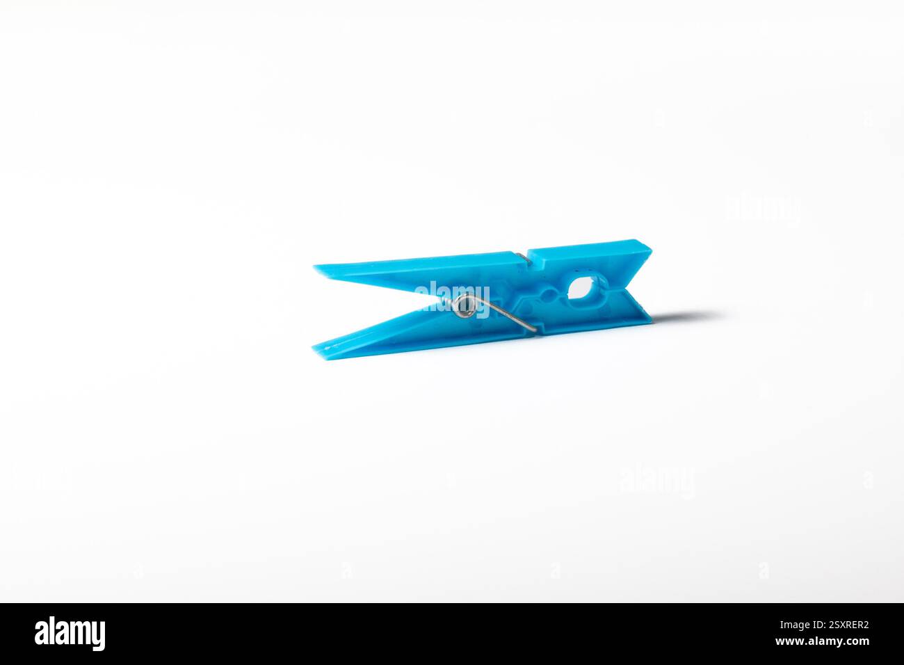 Plastic clothes peg isolated on white background Stock Photo - Alamy