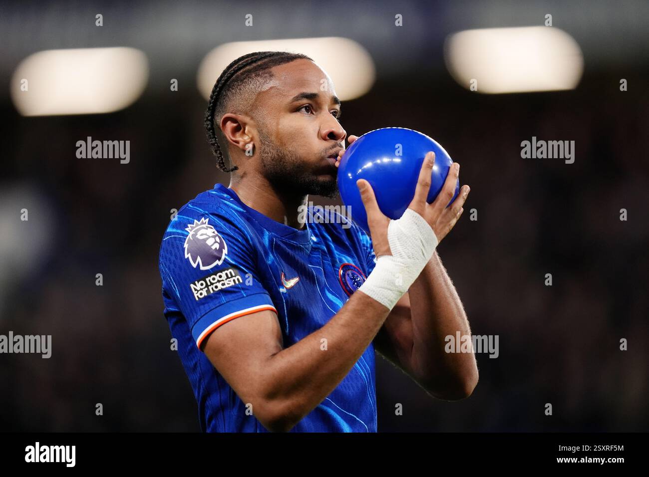Chelsea's Christopher Nkunku celebrates scoring their side's first goal ...