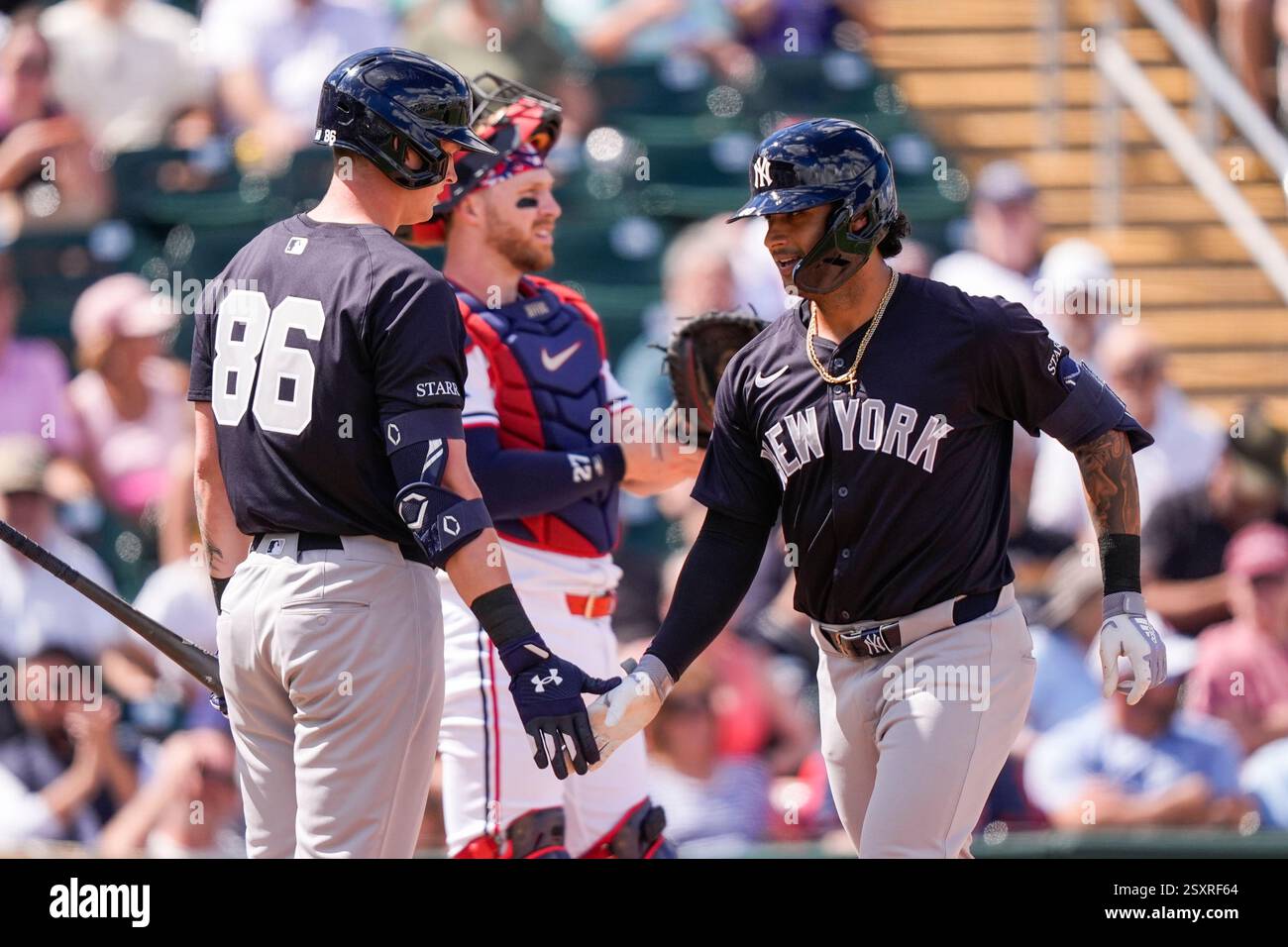 New York Yankees Everson Pereira is greeted by T.J. Rumfield (86) on a ...