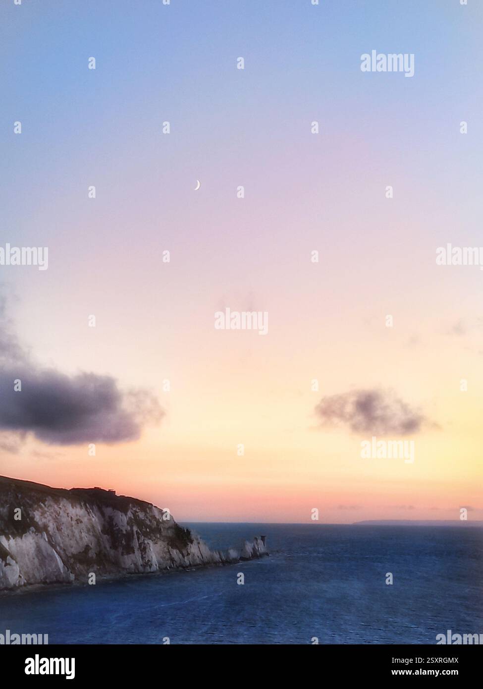 The Needles and Lighthouse at Sunset, Isle of Wight, England Stock ...