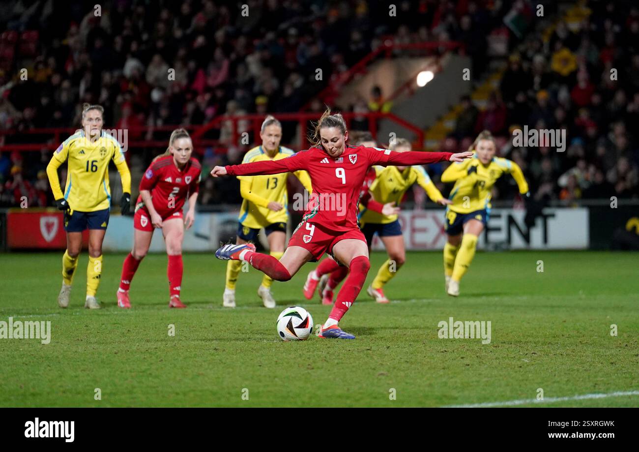Wales' Kayleigh Barton scores their side's first goal of the game ...