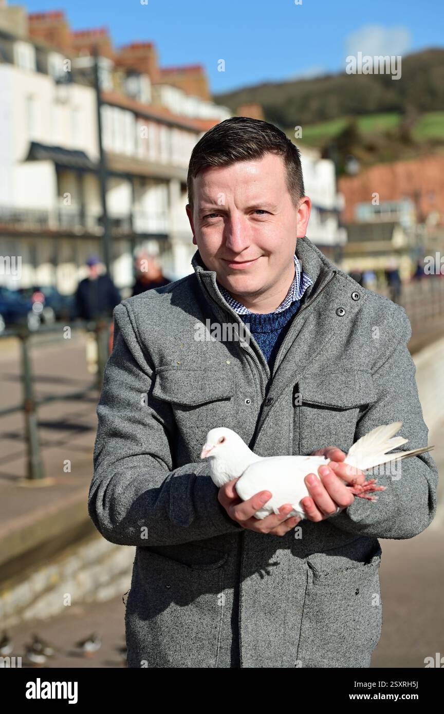 Sidmouth, UK. 25th Feb, 2025. UK Weather. Picture of James reunited ...