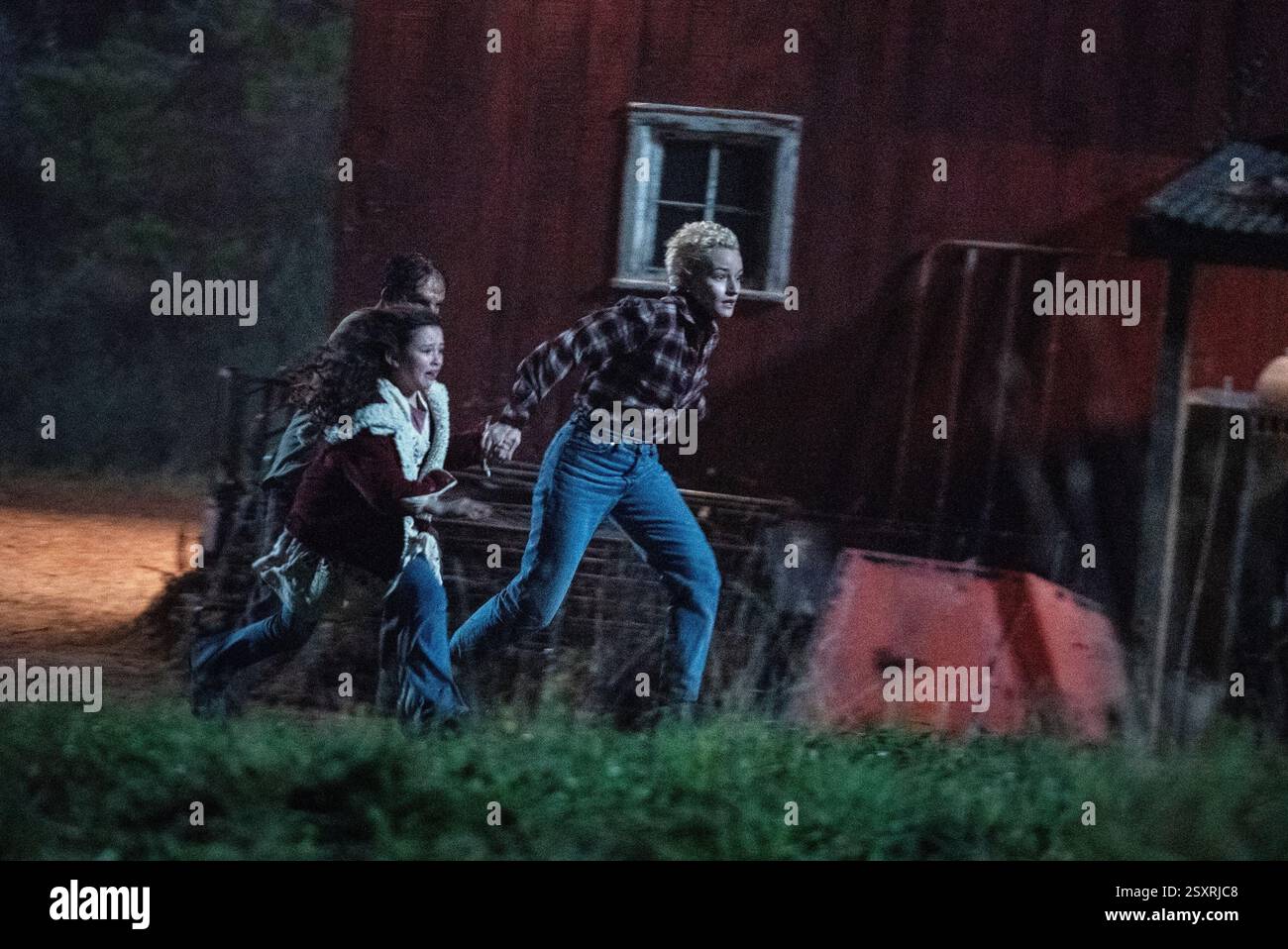 Wolf Man (2025)Julia Garner as Charlotte Lovell Christopher Abbott as ...