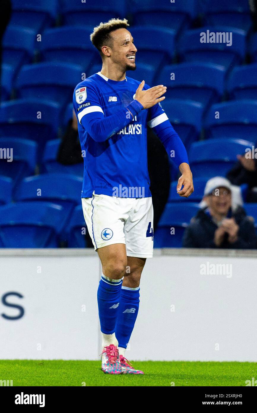 Cardiff, UK. 25th Feb, 2025. Callum Robinson of Cardiff City celebrates ...