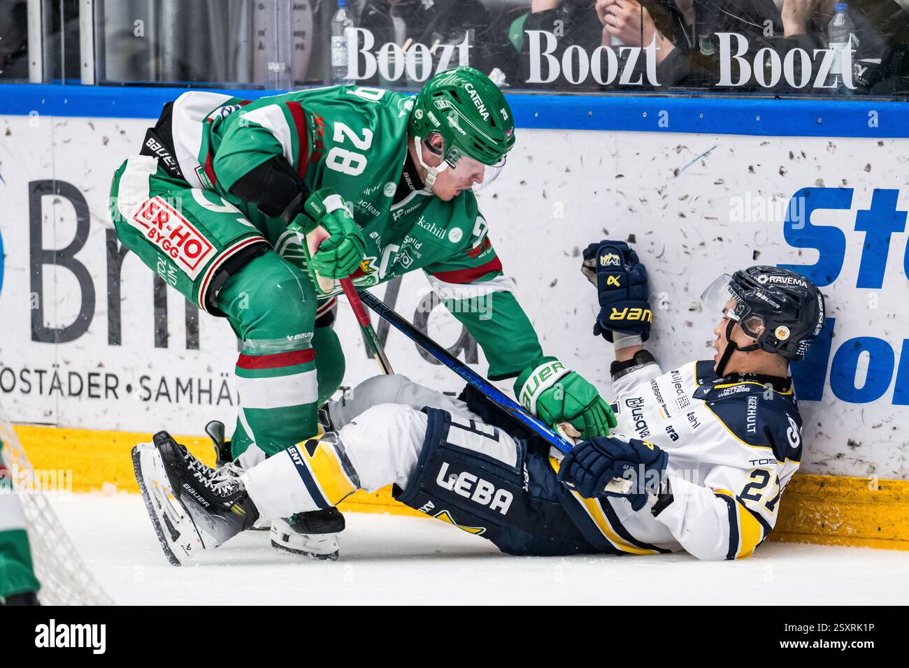 250225 Rögles Anton Bengtsson och HV71s Jonathan Ang under ...