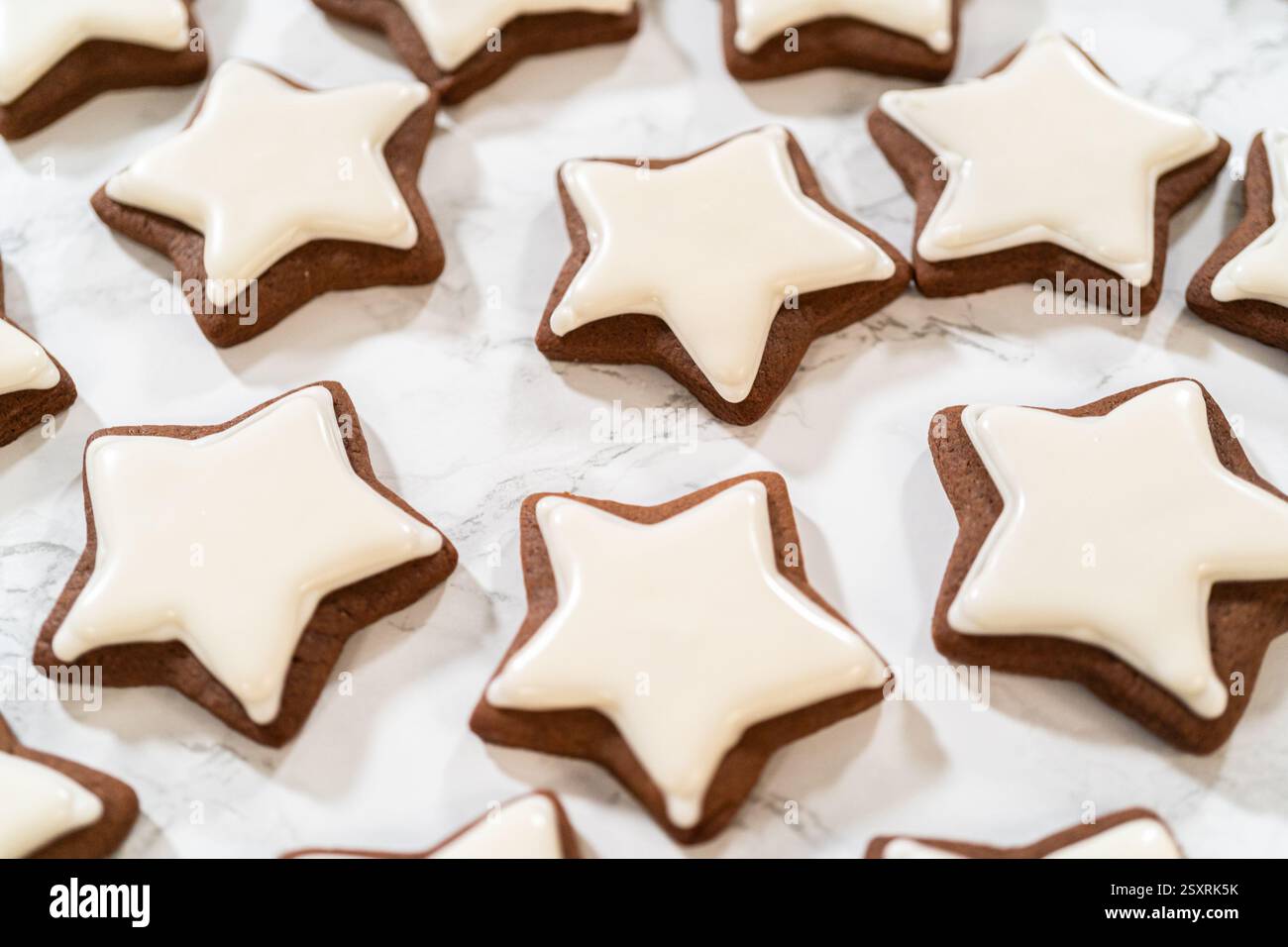 Perfectly Icing Star Cookies with Royal Icing Stock Photo - Alamy