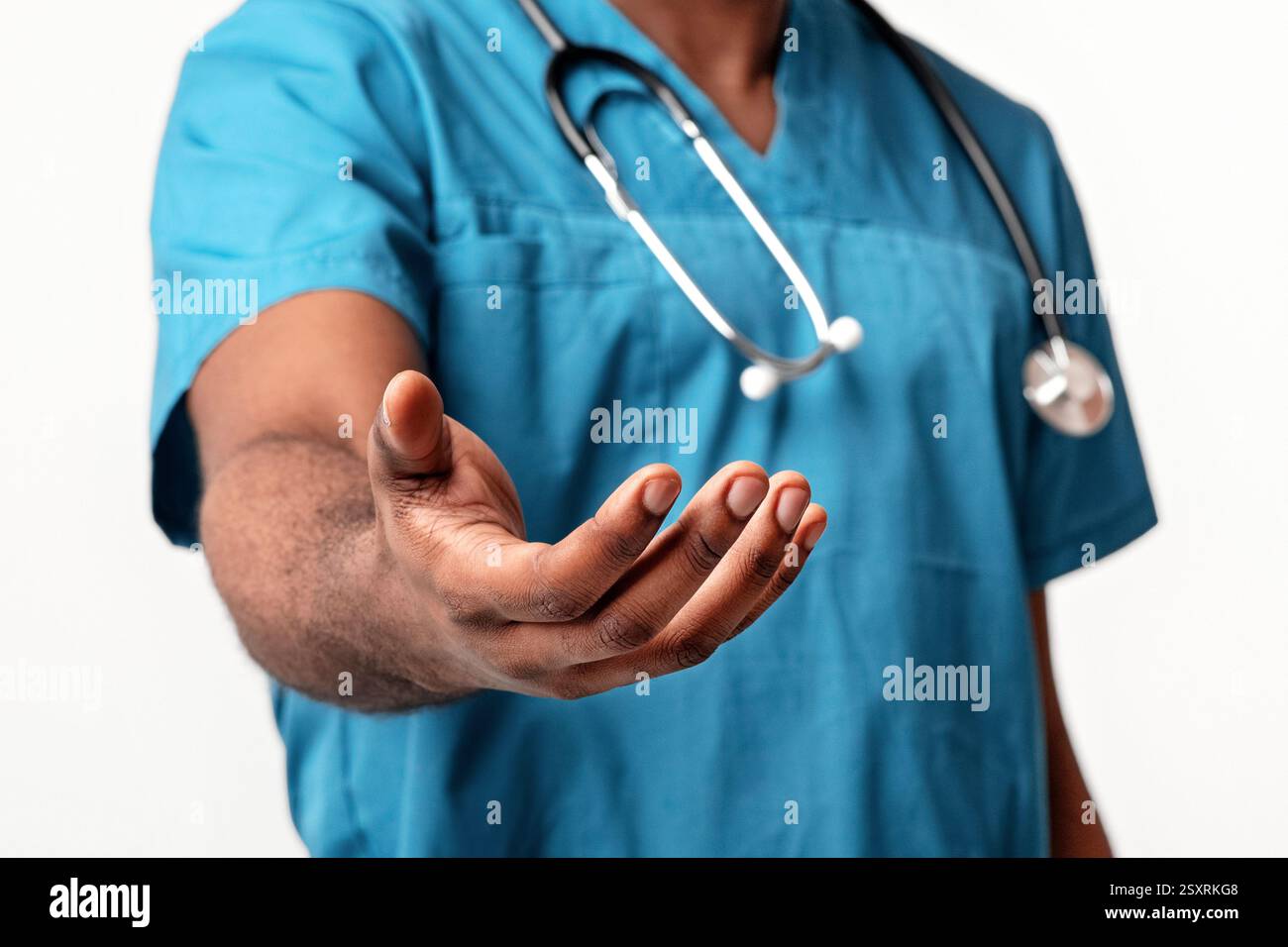 Healthcare professional extending hand for patient support and care ...