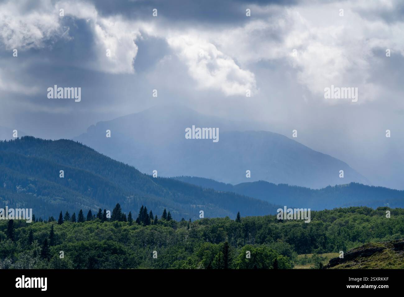 Rain falling on overlapping forested ridges of the blue ridge mountains ...