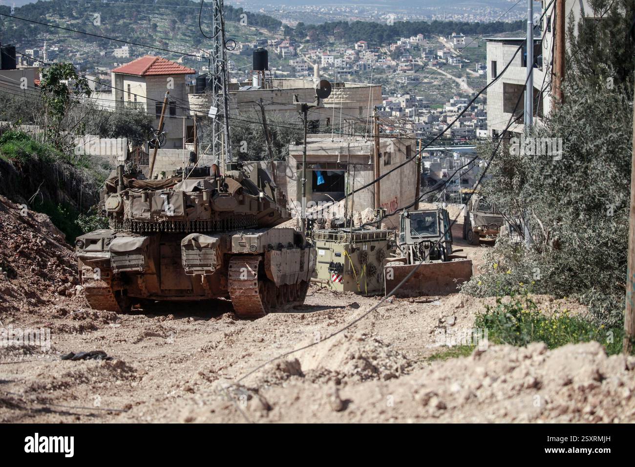 Jenin, West Bank, Palestine. 25th Feb, 2025. Israeli military armored ...