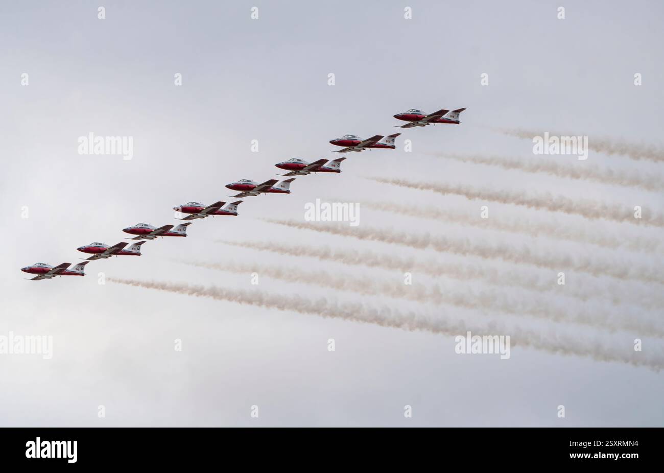 The canadian forces snowbirds demonstration team performing a diagonal ...