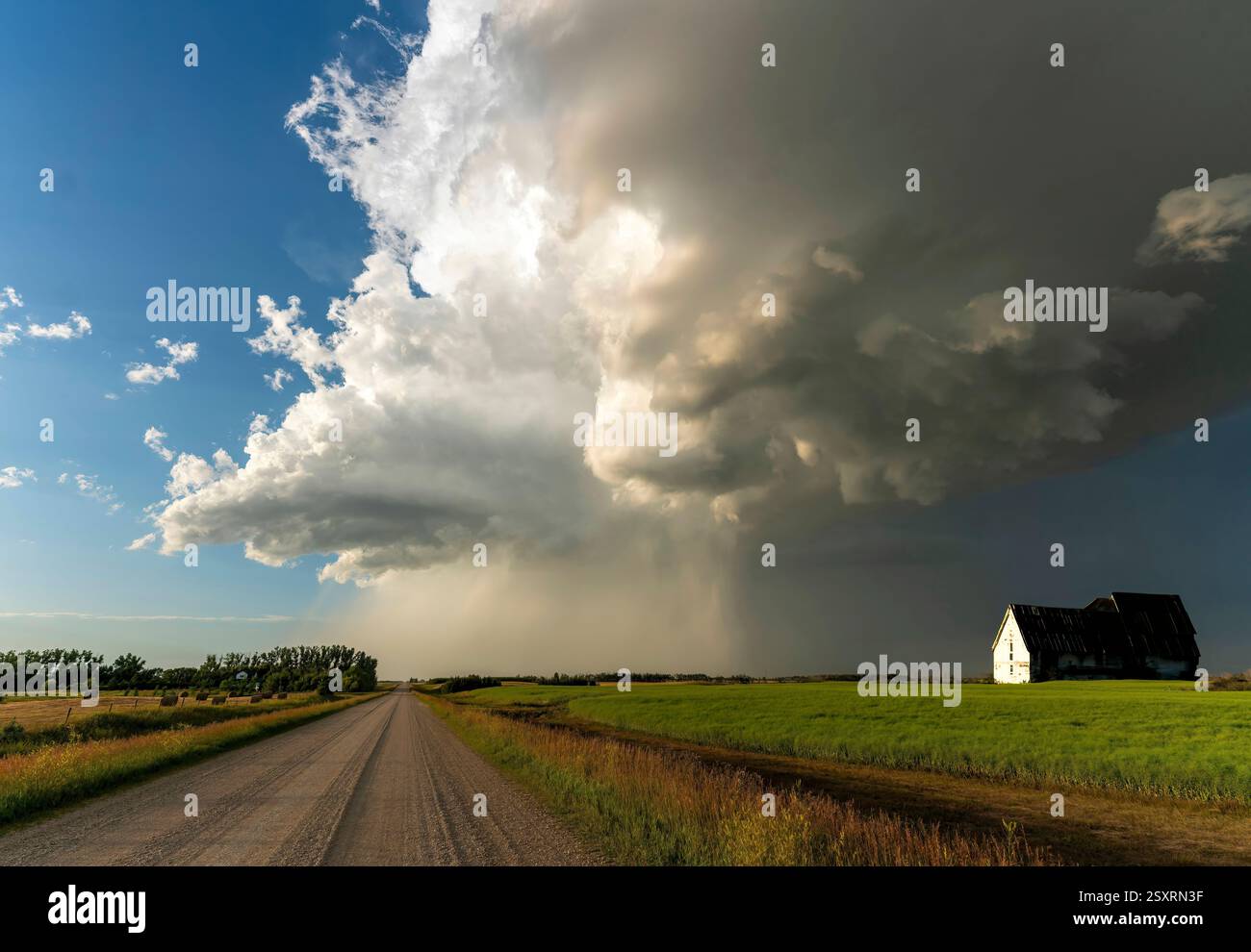 Dramatic supercell storm clouds forming over a farm in the canadian ...