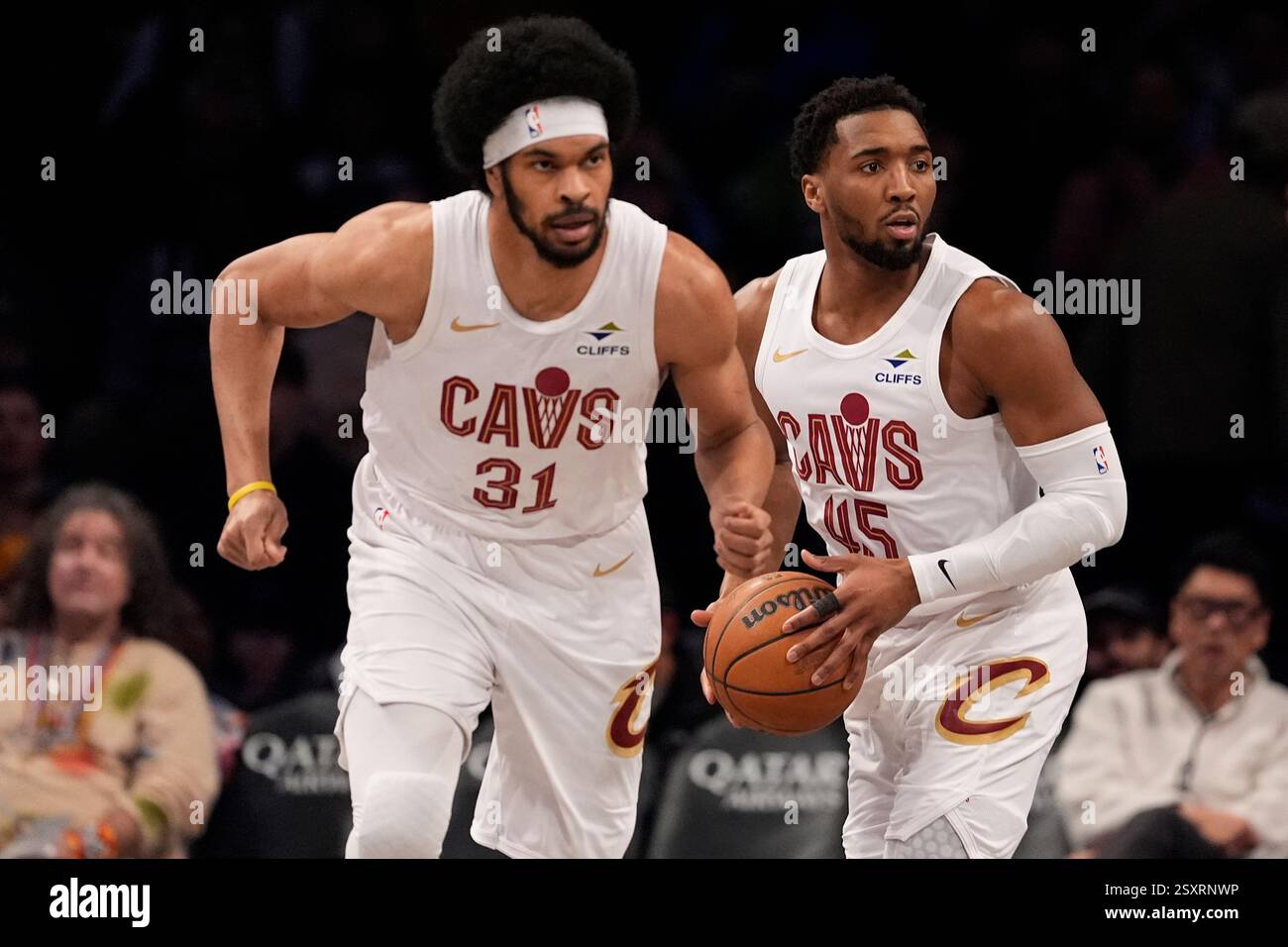 Cleveland Cavaliers' Donovan Mitchell (45) and Jarrett Allen (31 ...